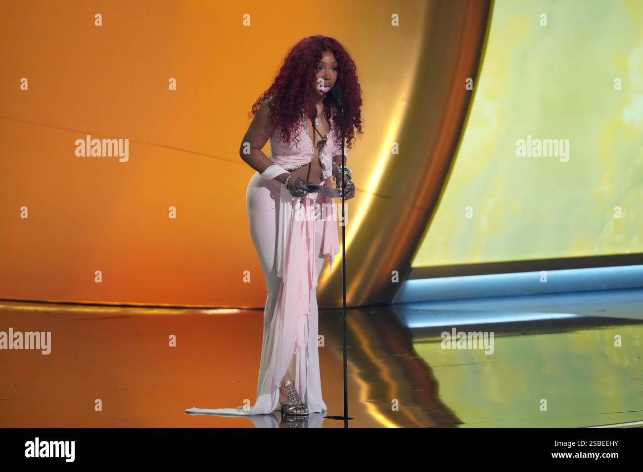 SZA presents the award for best pop duo/group performance during the ...