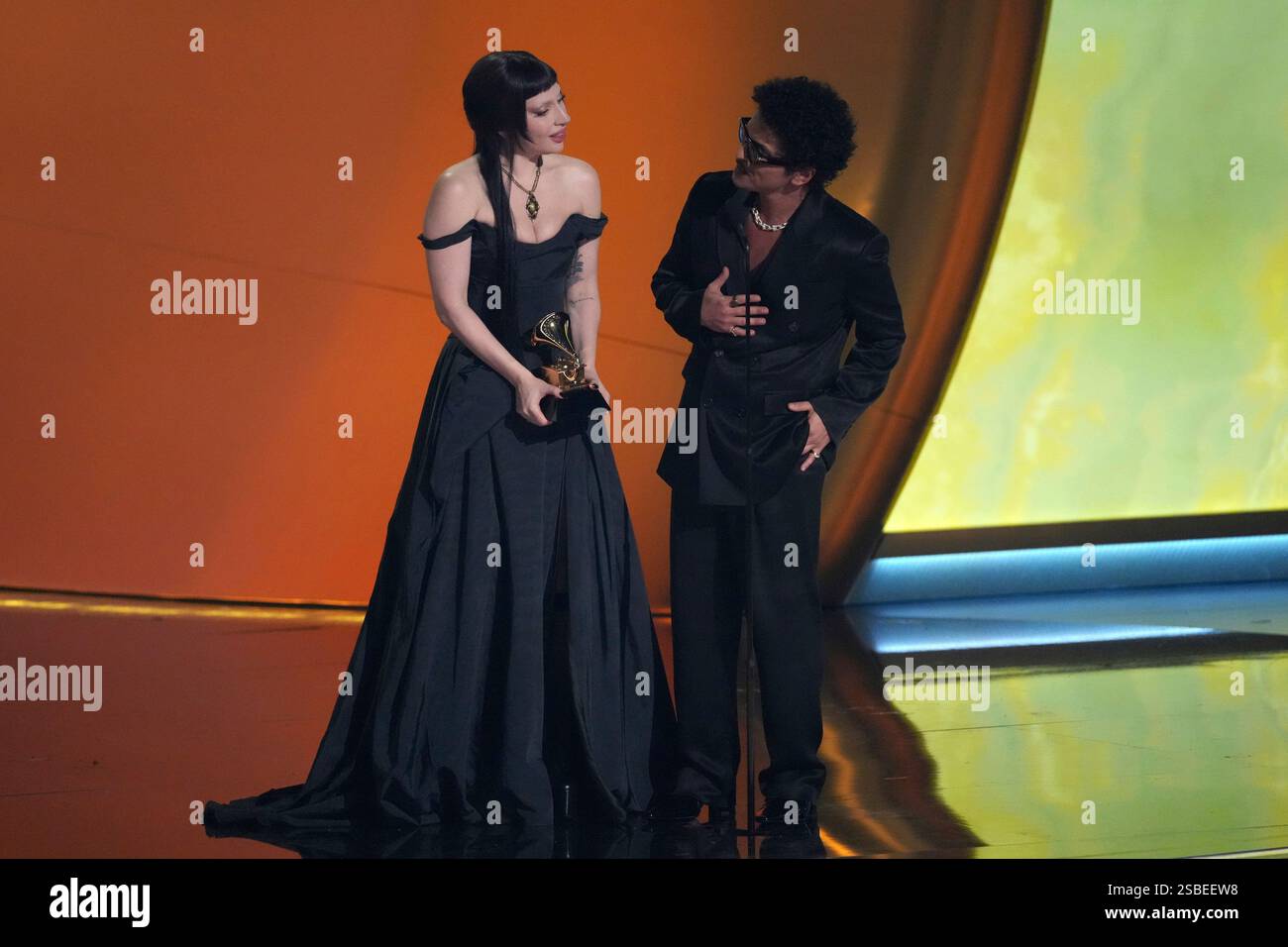 Lady Gaga, left, and Bruno Mars accept the award for best pop duo/group ...