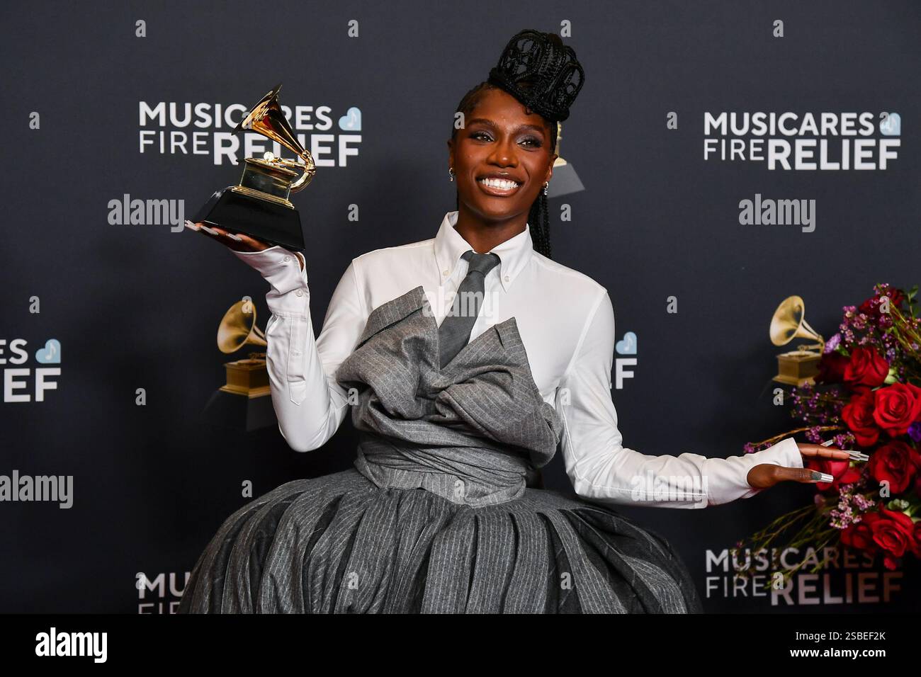 Doechii poses in the press room with the award for best rap album for ...