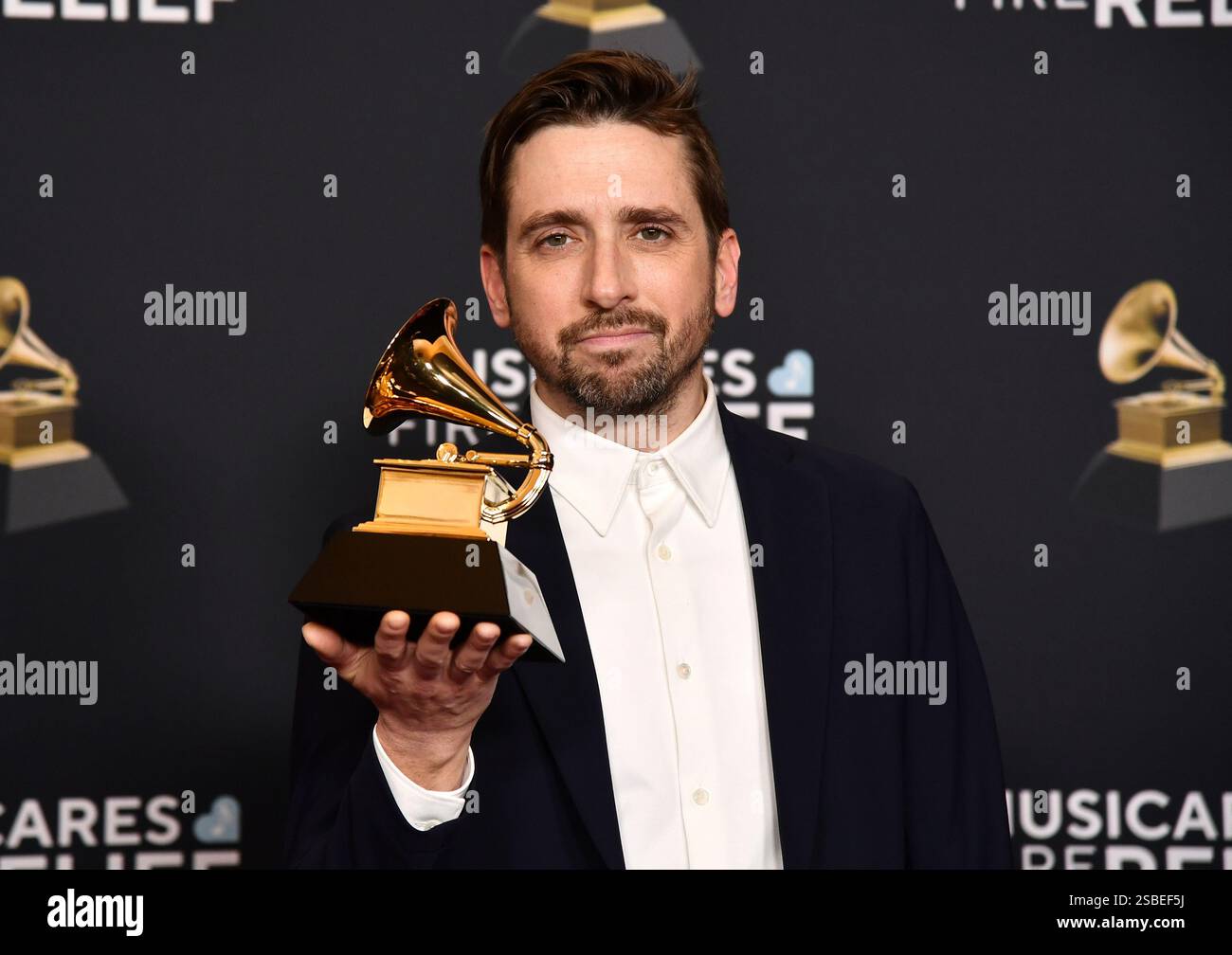 Eric Cha-Beach of So Percussion poses in the pressrom with the award ...
