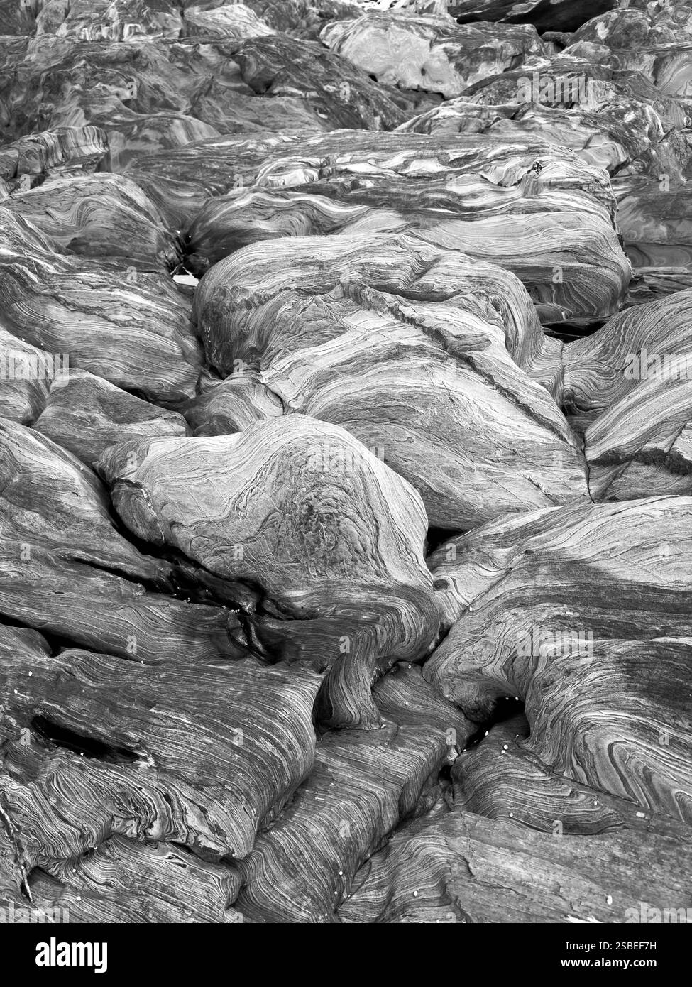 Black and white abstract background of natural rock shapes and patterns ...
