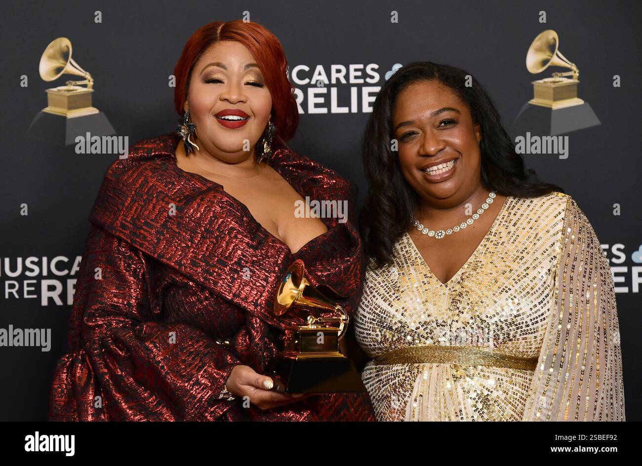 Karen Slack, left, and Michelle Cann pose in the press room with the ...