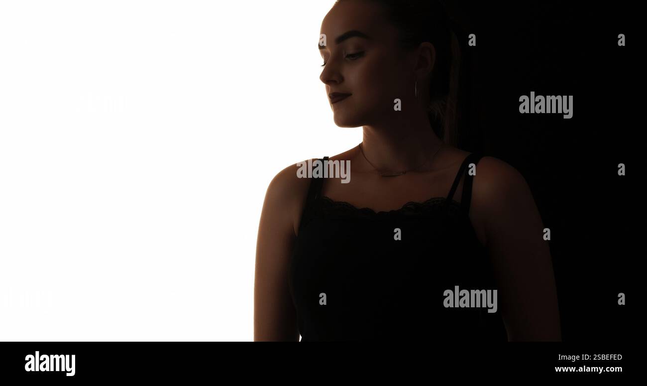 Female confidence. Beauty silhouette. Dark outline of pensive tranquil ...