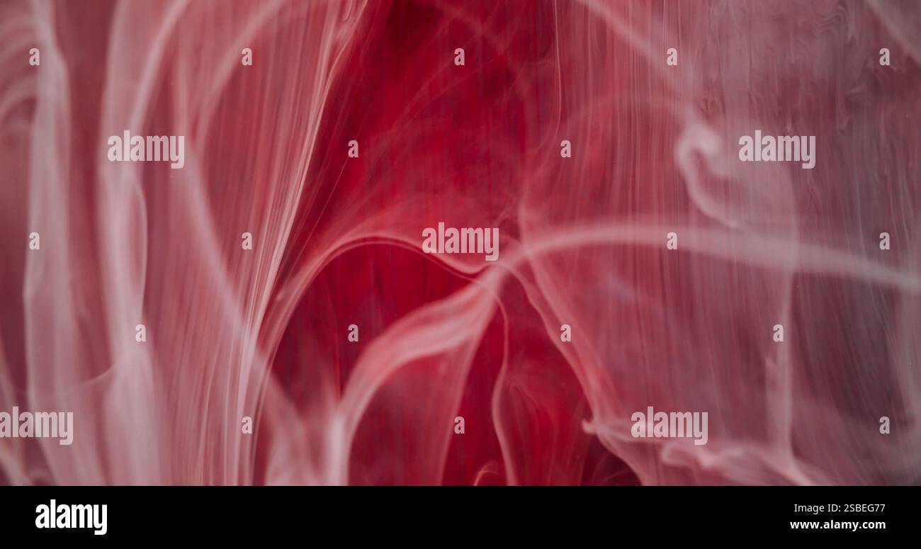 Pouring paint drop. Blur ink water. Defocused white red color shine liquid fluid smoke mist ...