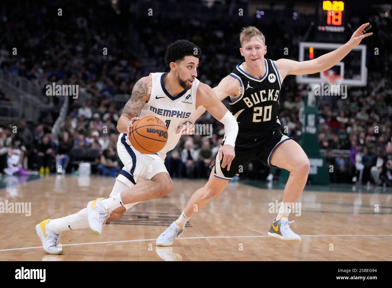 Memphis Grizzlies' Scotty Pippen Jr. drives past Milwaukee Bucks' AJ ...