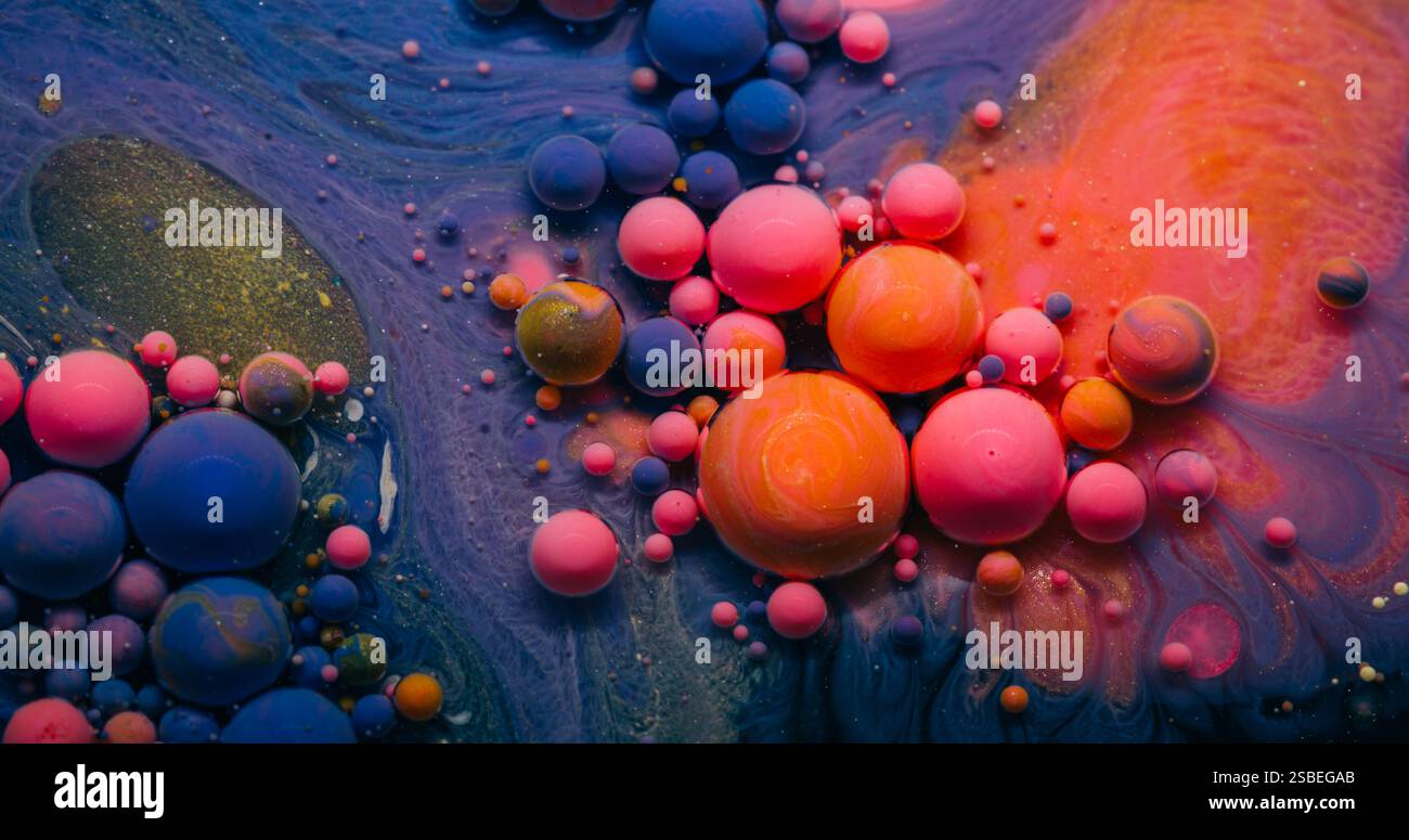 Acryl bubble. Art fluid. Paint violet pink orange spilling pigment ...