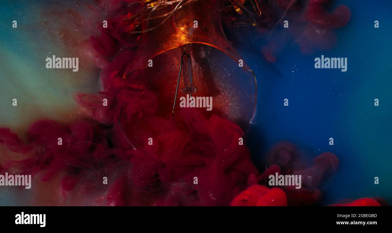 Flow explode. Ink mist. Red smoky paint wavy cloud spilling on blurred ...