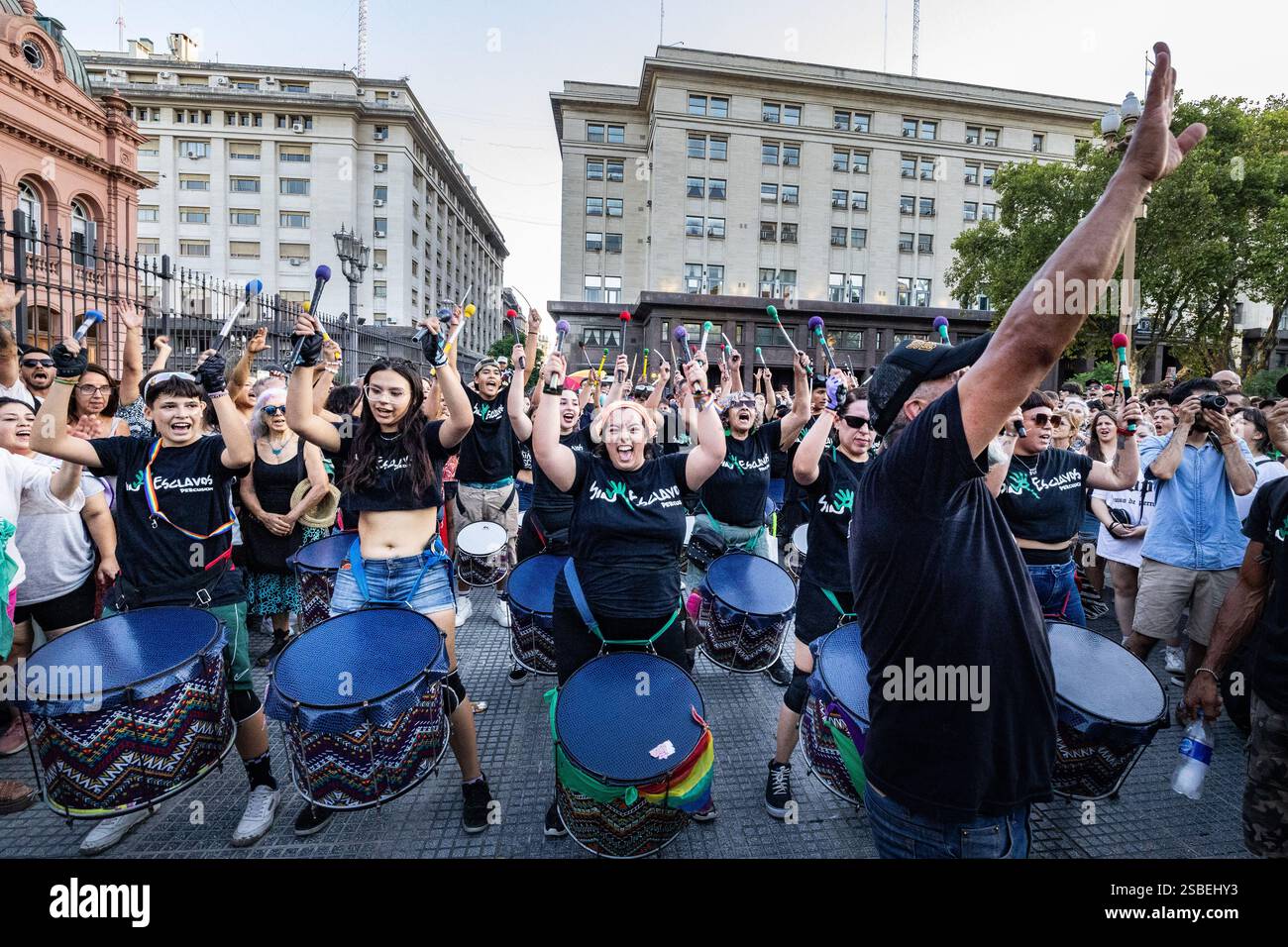A group of women from the LGBT+ movement drum in front of the Casa ...