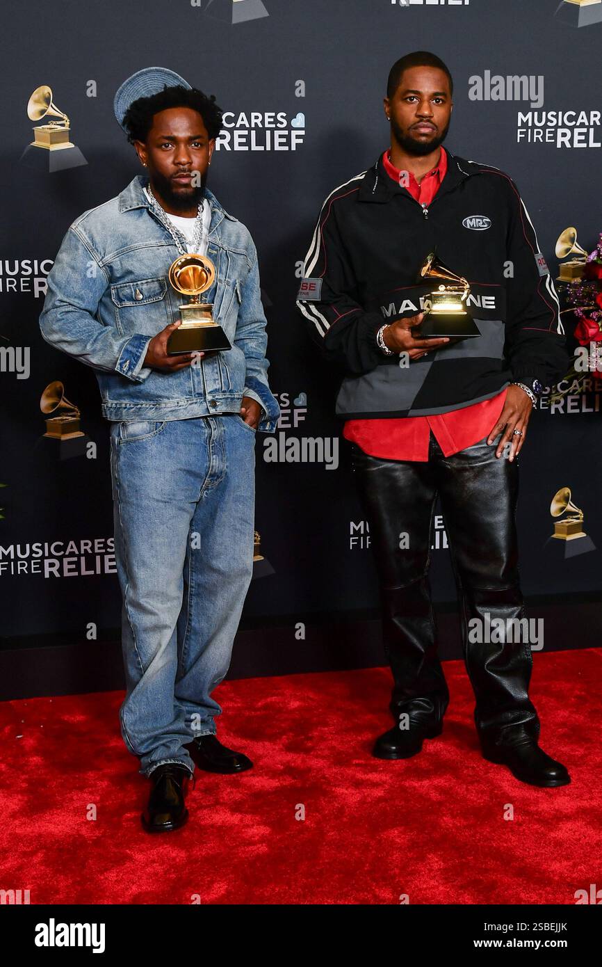 Kendrick Lamar , left, and Dave Free pose in the press room with the ...