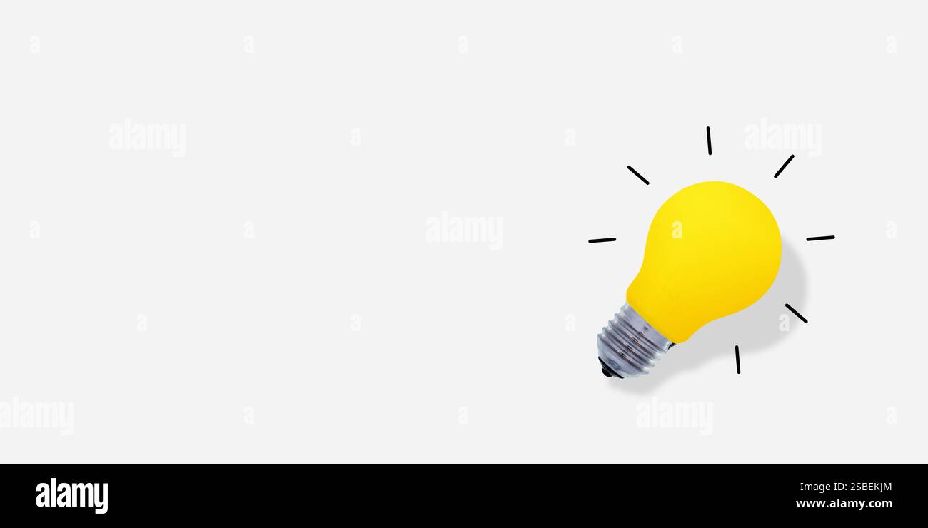 Yellow glass bulb with hard shadow, on the left side. Lightbulb on ...