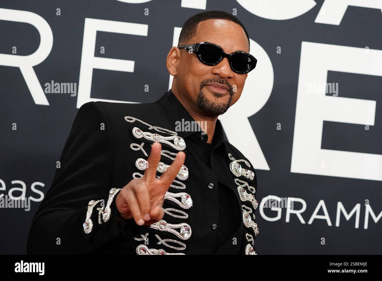 Will Smith arrives at the 67th annual Grammy Awards on Sunday, Feb. 2 ...