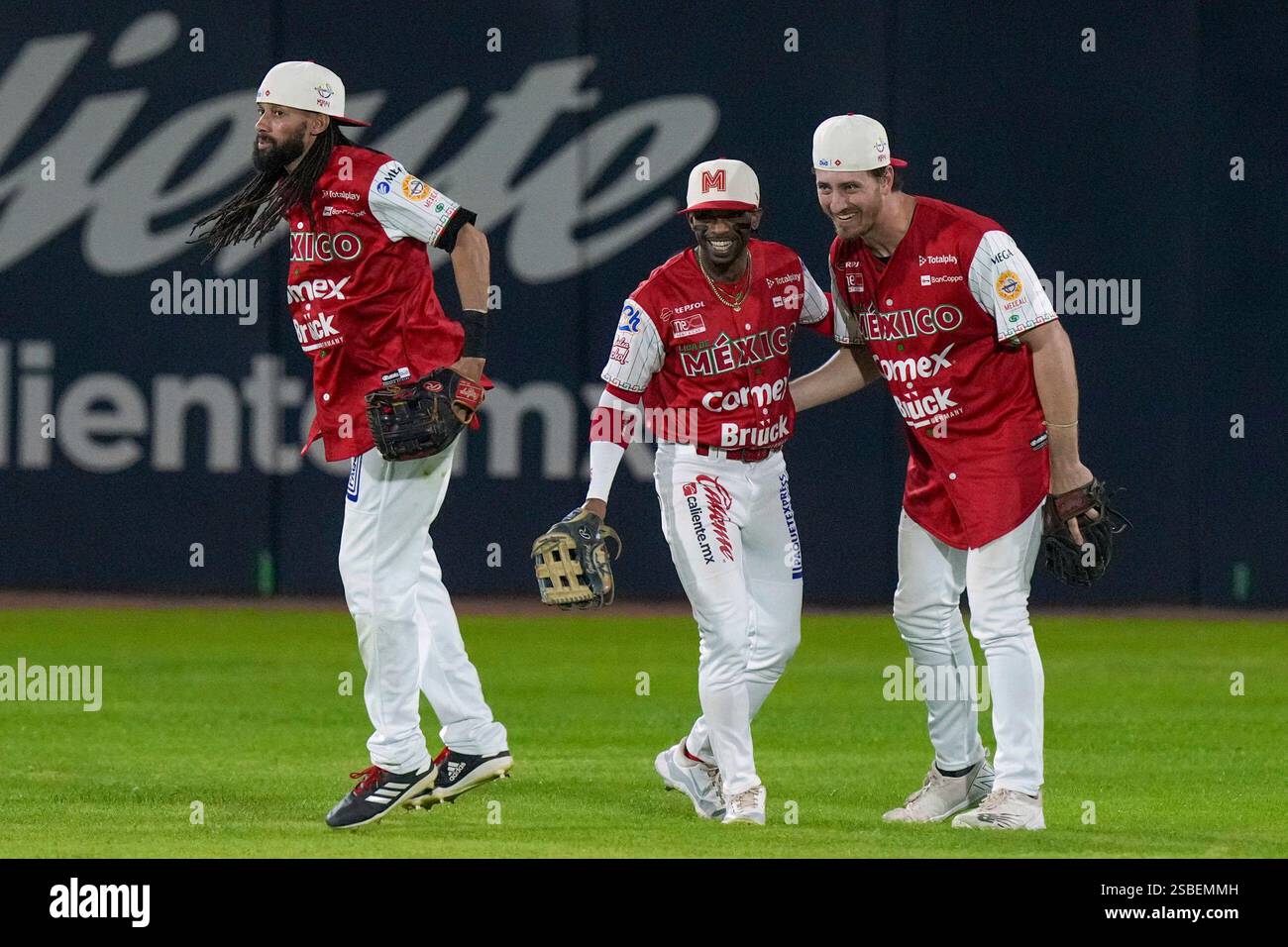 Mexico's outfielders celebrate after a Caribbean Series baseball game ...