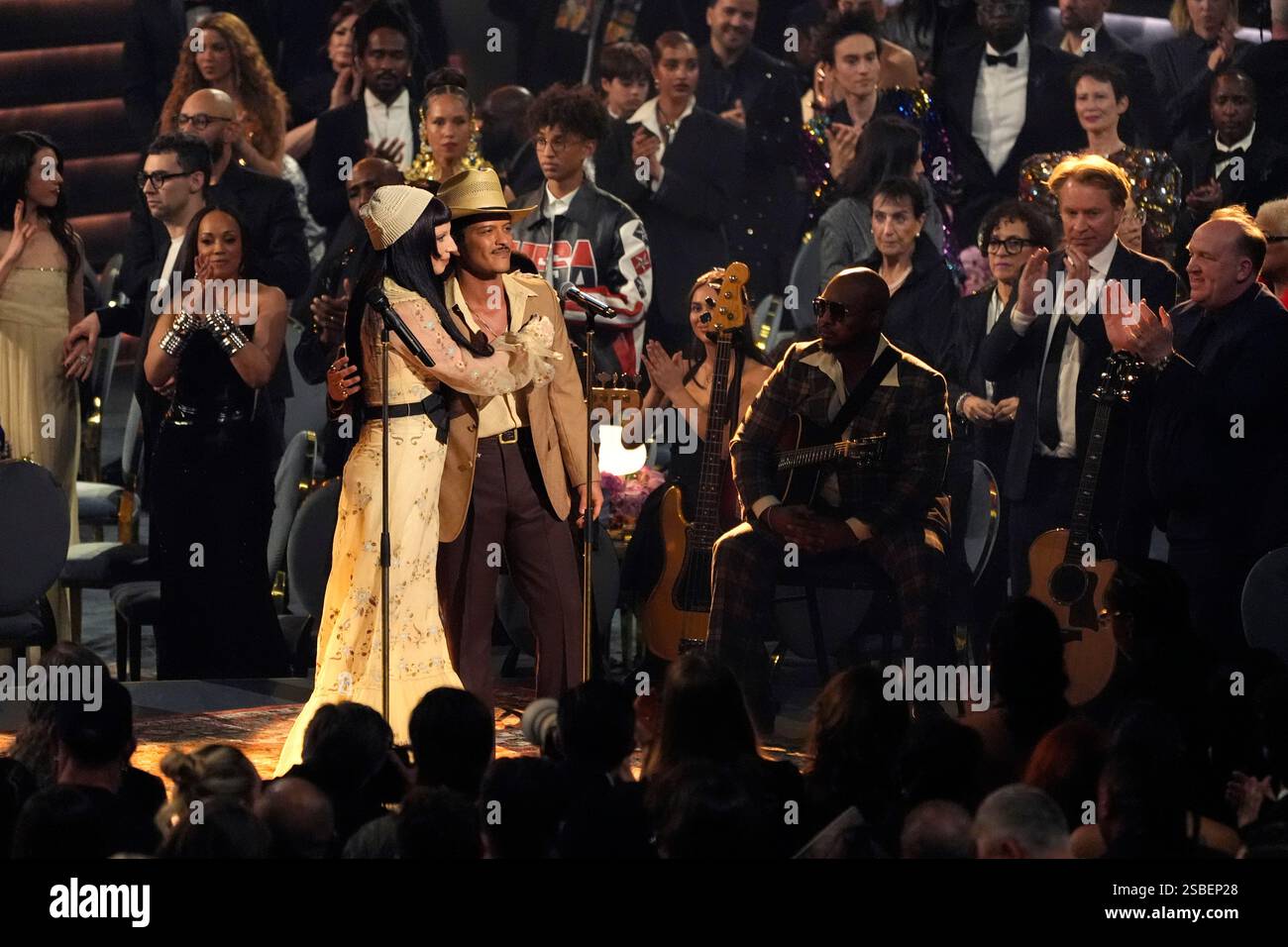 Lady Gaga, left, and Bruno Mars perform "California Dreamin'" during the 67th annual Grammy ...