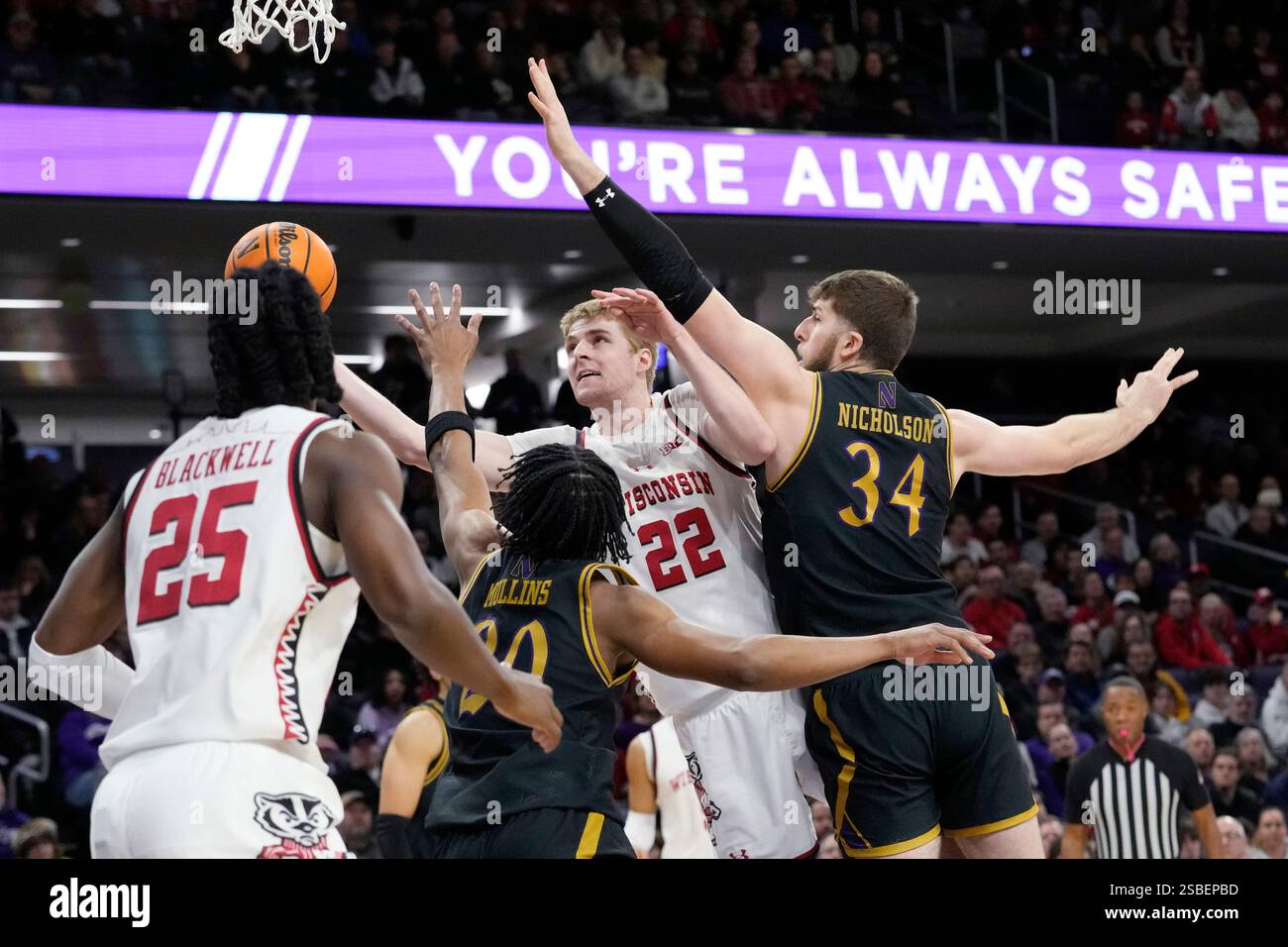 Wisconsin forward Steven Crowl (22) drives to the basket against ...