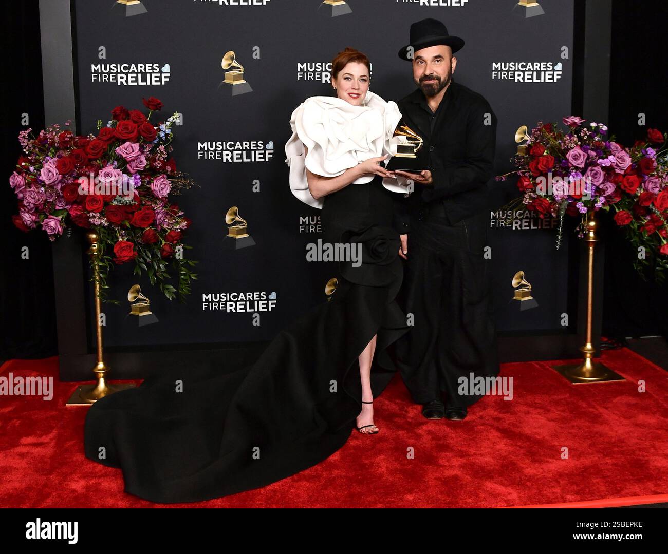 Alisha Gaddis, left, and Lucky Diaz pose in the press room with the ...