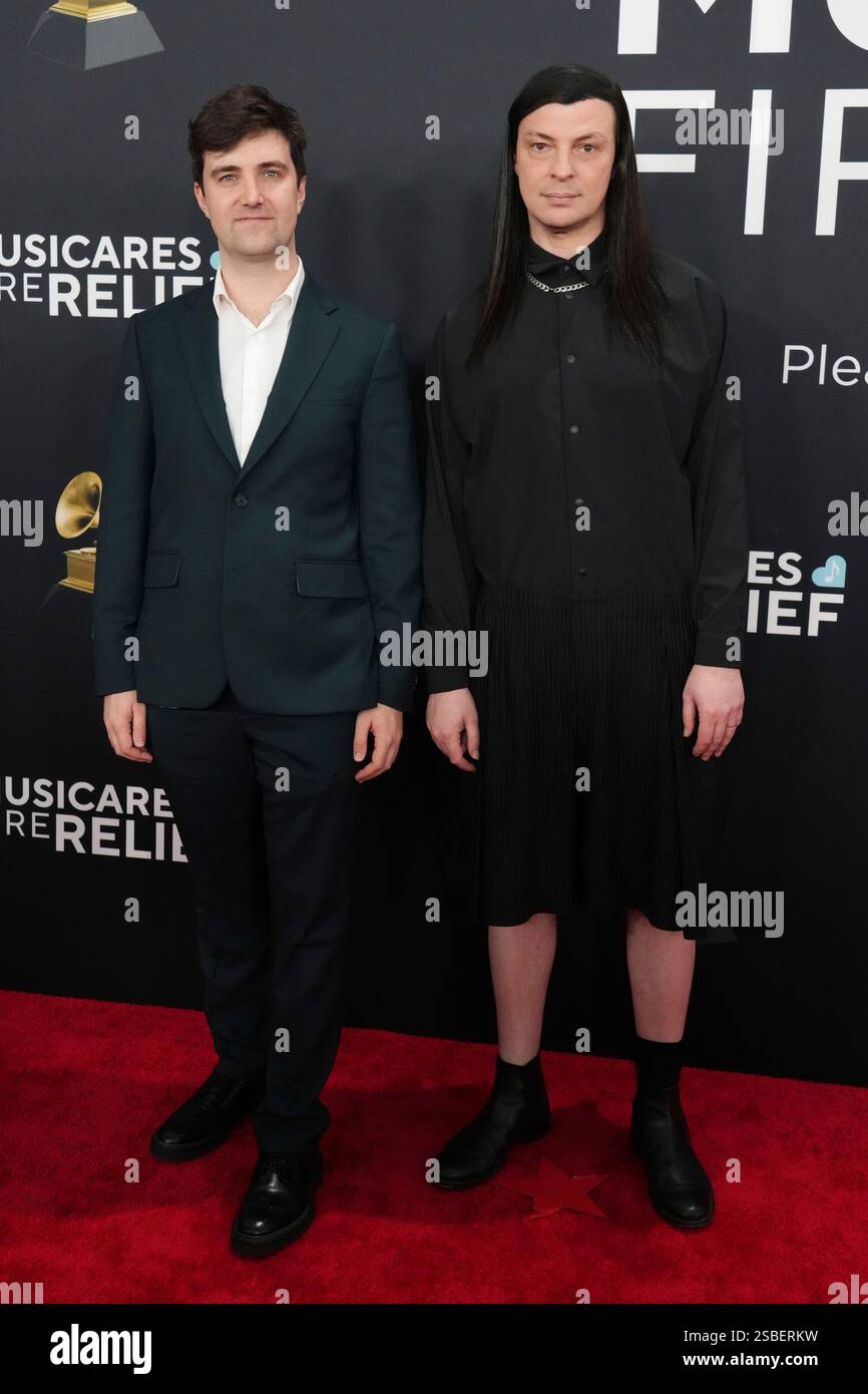 Nick Chuba, left, and Leopold Ross arrive at the 67th annual Grammy ...