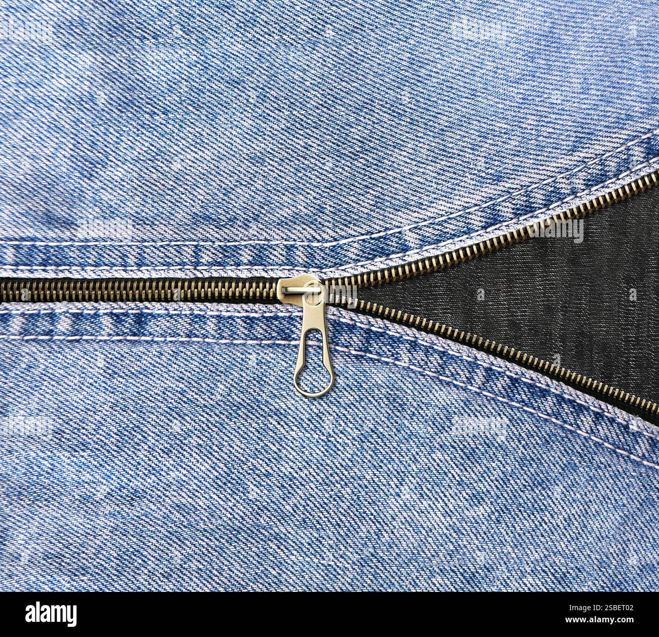Denim zipper opened. Unzipped zipper or fastener. Open zip and denim ...