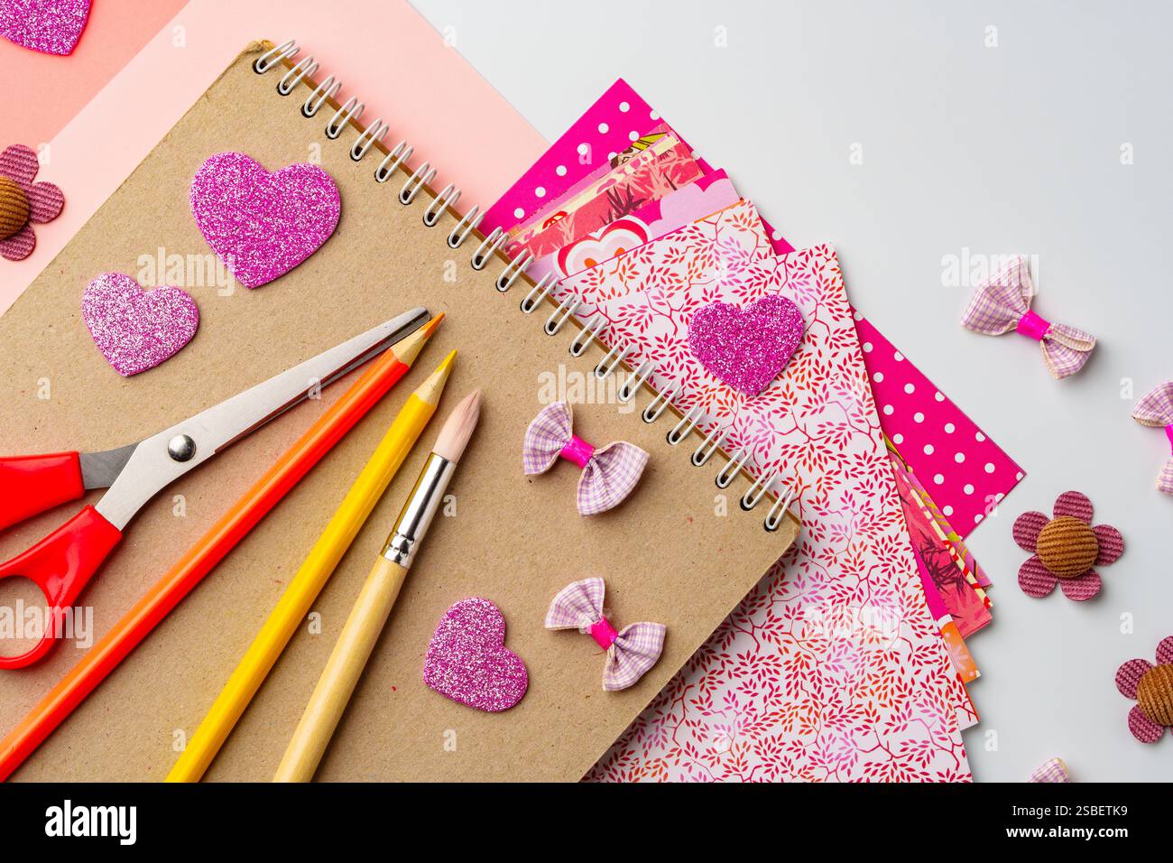 Creative crafting session with colorful materials and tools on a ...