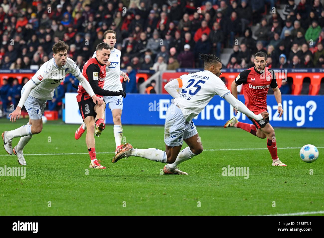 Leverkusen, Germany. 02nd Feb, 2025. Florian Wirtz (2nd L) of Bayer 04 Leverkusen tries to score ...