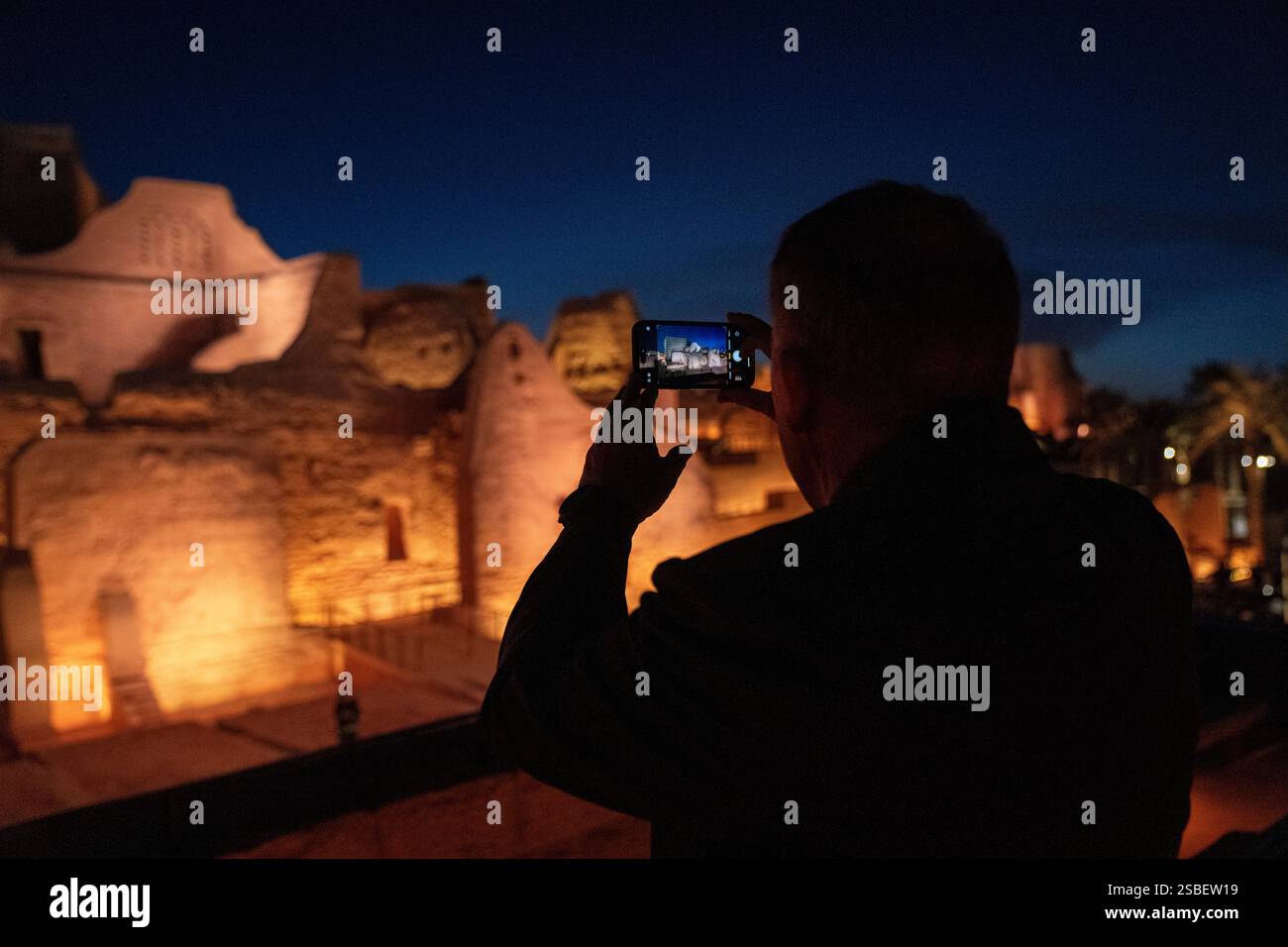 Danish Foreign Minister Lars Loekke Rasmussen takes a photo as he ...