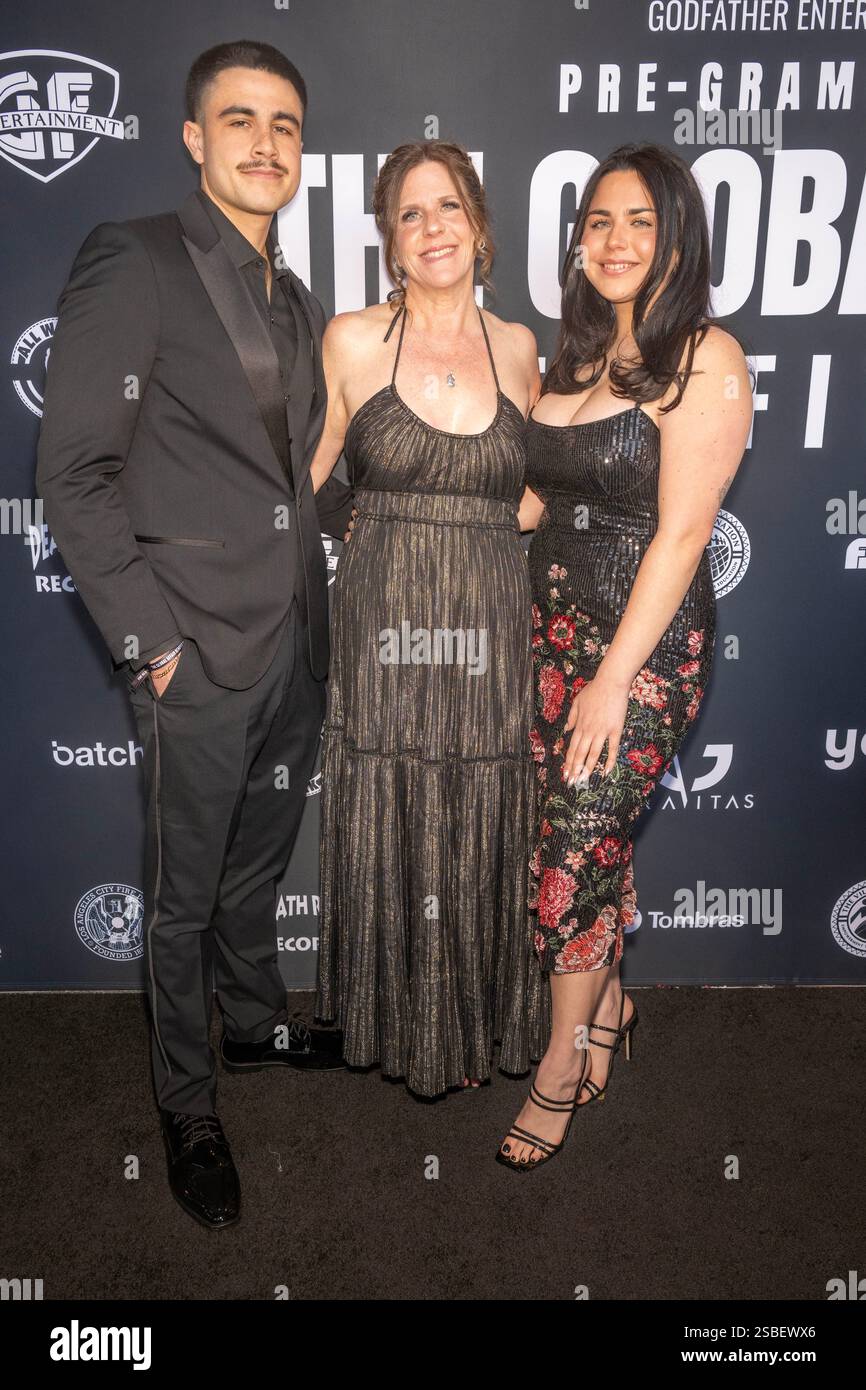 Jacob Munoz, Firefighter widow Kate Munoz, Jackie Munoz attend the ...