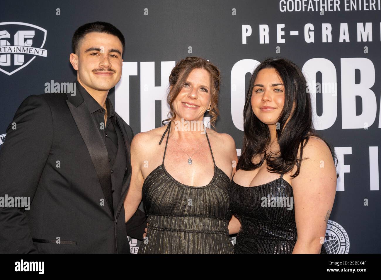 Jacob Munoz, Firefighter widow Kate Munoz, Jackie Munoz attend the ...