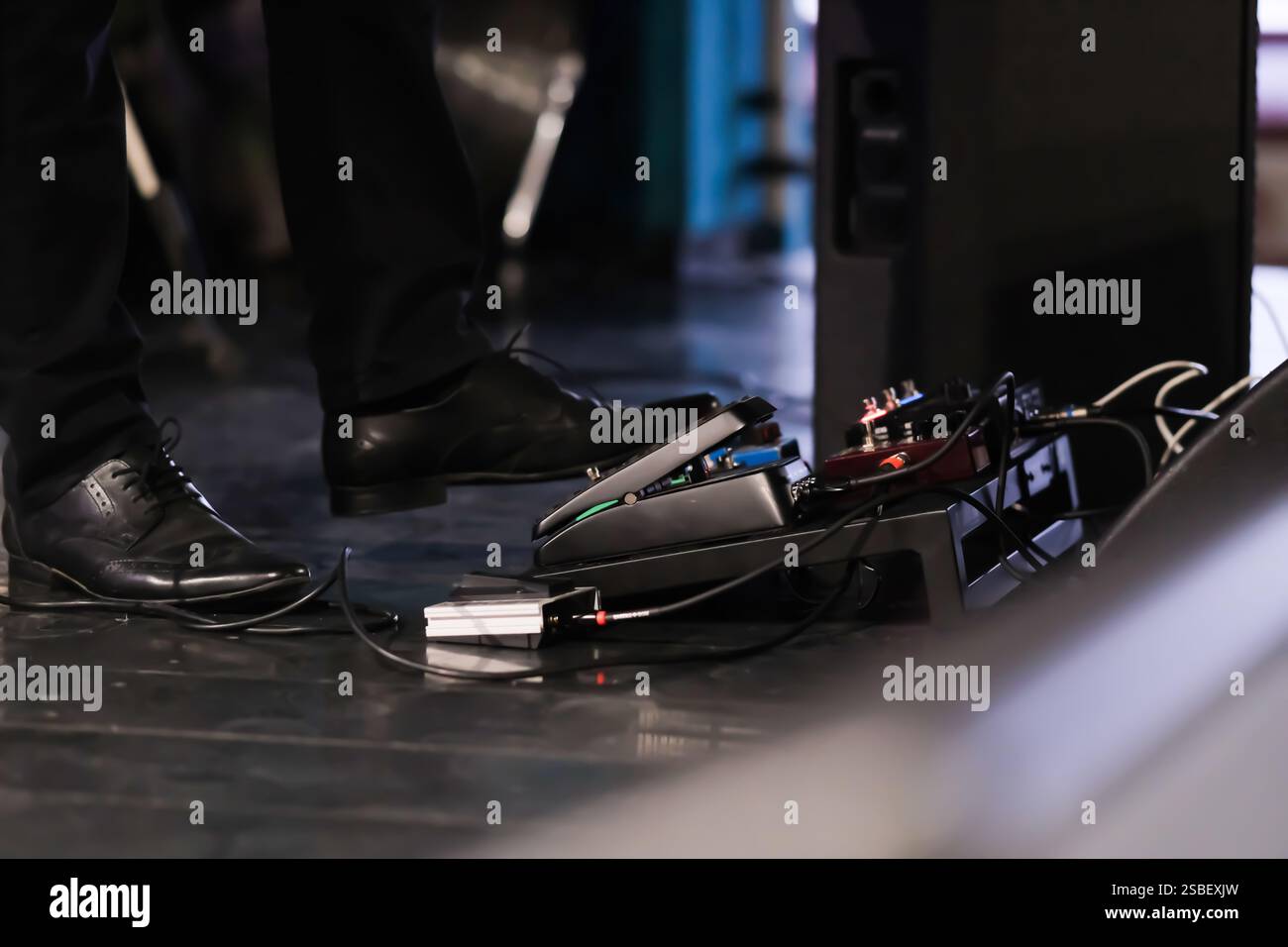 Guitar pedal board on stage Stock Photo - Alamy