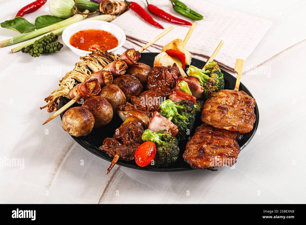 Asian grilled skewer assortment satay with beef, porl, chicken and ...