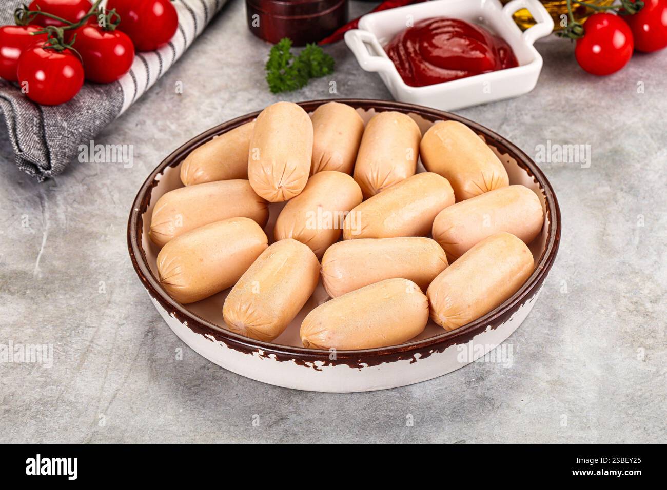 Dietary baby mini chicken sausage in the bowl with ketchup Stock Photo ...