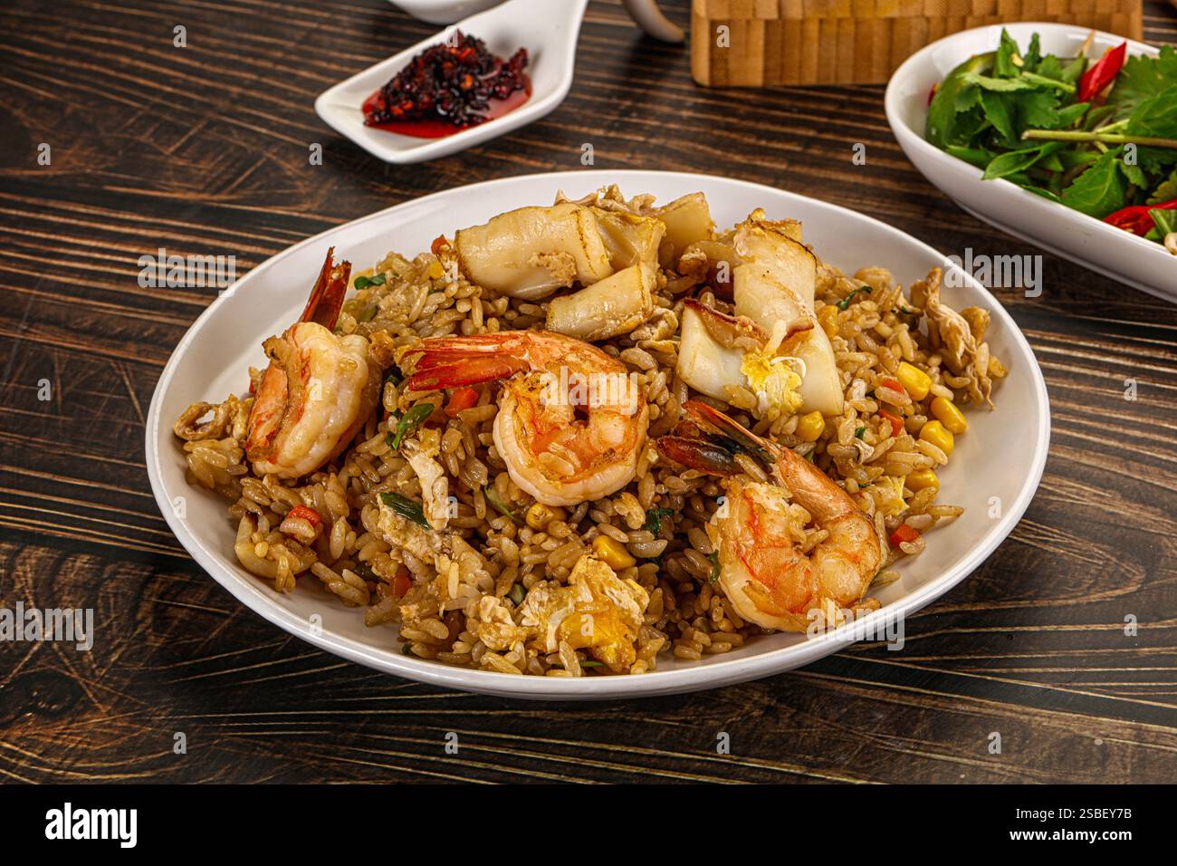 Vietnamese traditional fried rice with prawn and squid - Kom Ran Stock ...