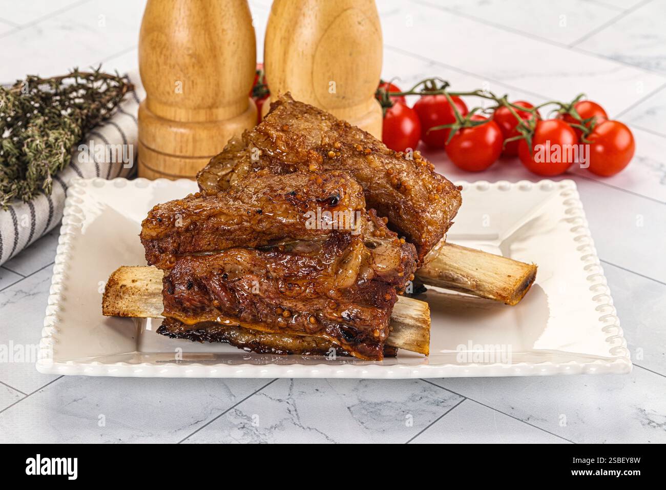 Baked beef ribs with marinade with seasoning Stock Photo - Alamy