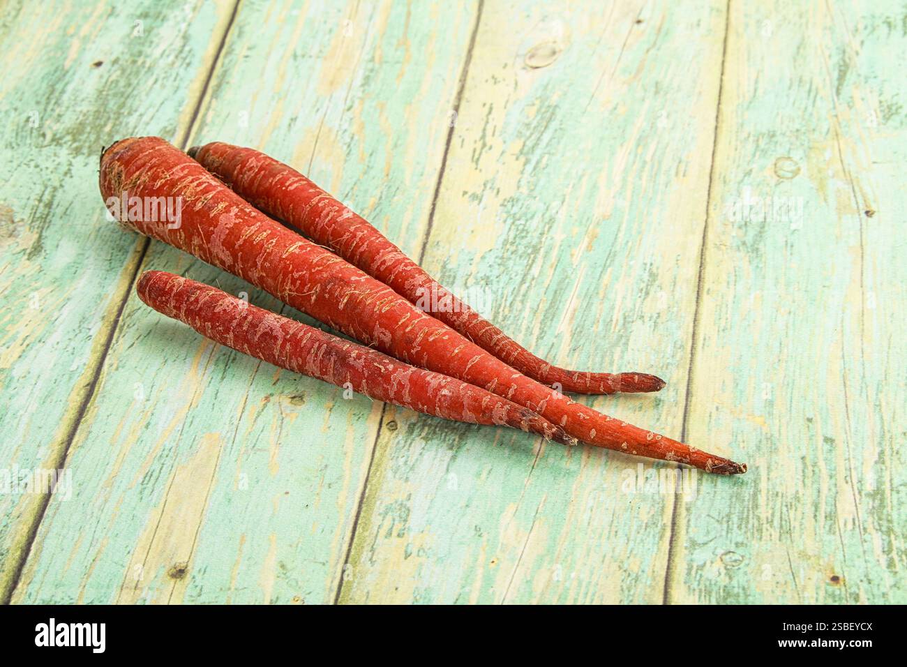 Red Indian raw carrot vegetable root Stock Photo - Alamy