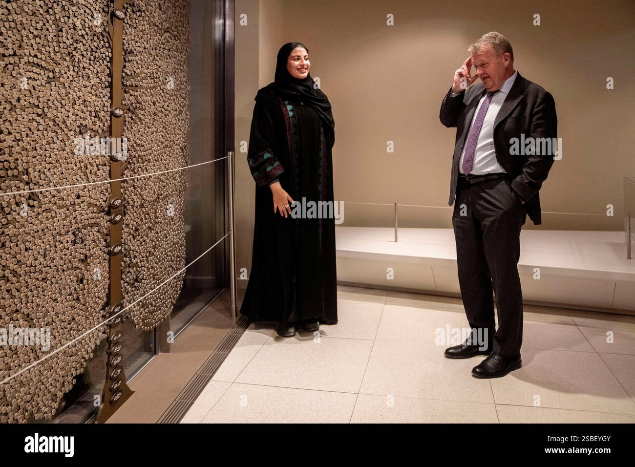 Danish Foreign Minister Lars Loekke Rasmussen, right, visits the ...