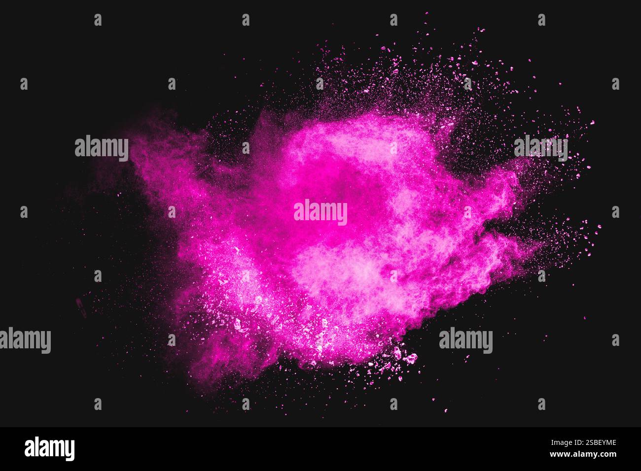 Pink cloud of powdery substance is floating in the air. The image has a ...