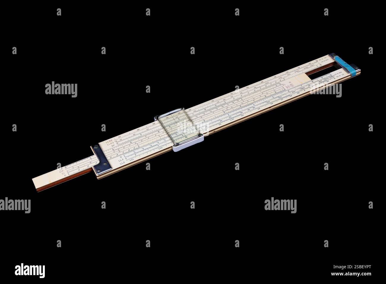 Vintage engineer's slide rule, 1950s. Yellow plastic, metal ends. Black ...