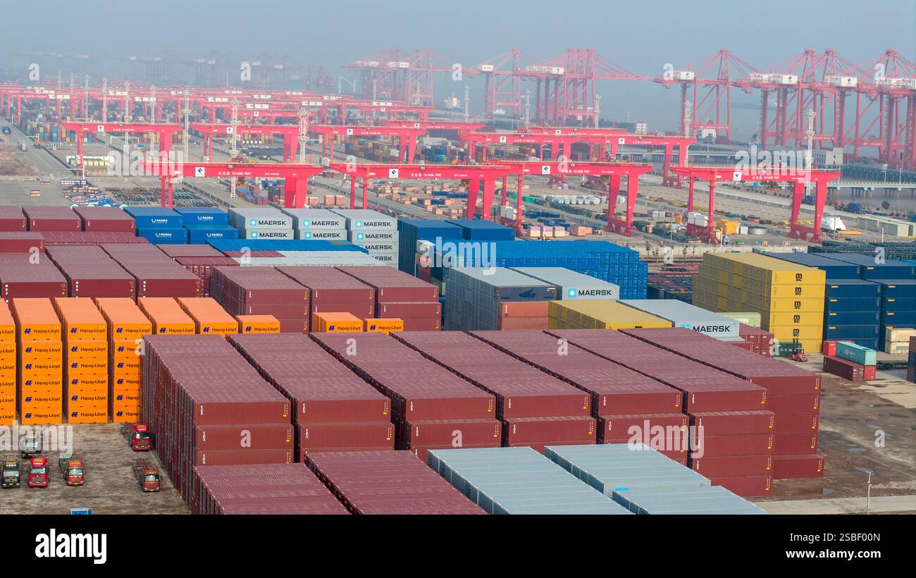 A cargo ship carries out container handling operations at the container ...