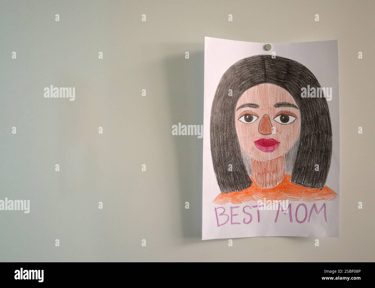 Photo of child's drawing. African looking woman. The inscription Best ...