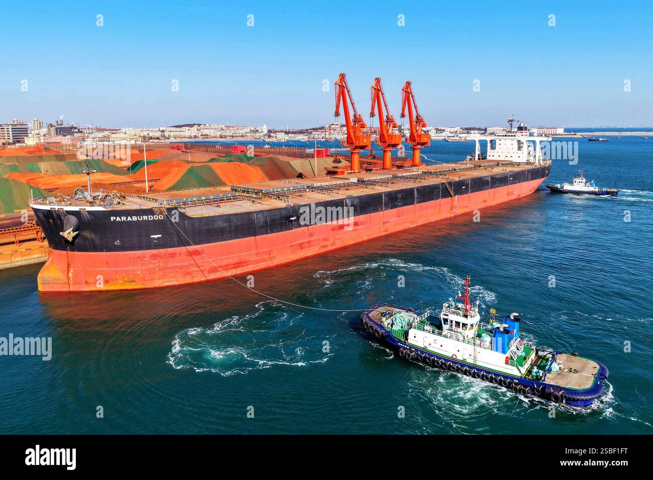 QINGDAO, CHINA - FEBRUARY 3, 2025 - A cargo ship unloading imported ...