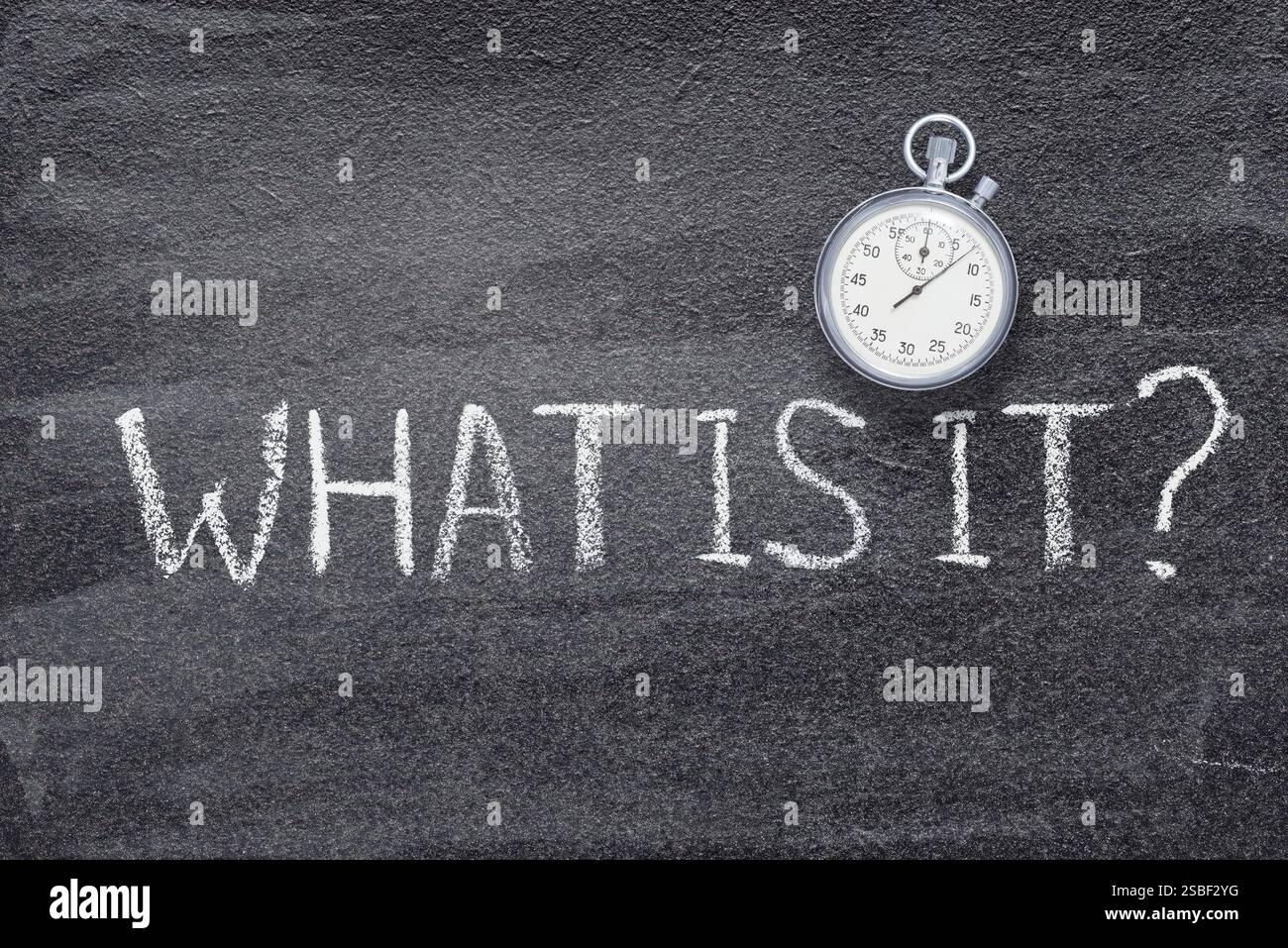what is it question written on chalkboard with vintage precise ...
