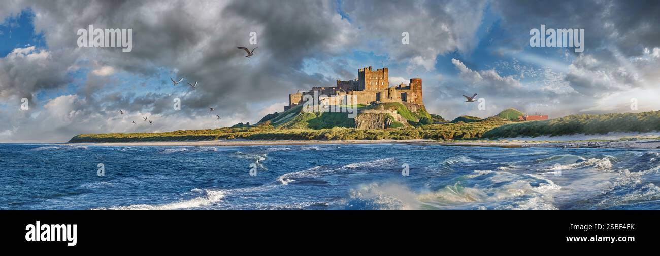 Photo of medieval historic Banburgh castle & beach with sea and waves ...