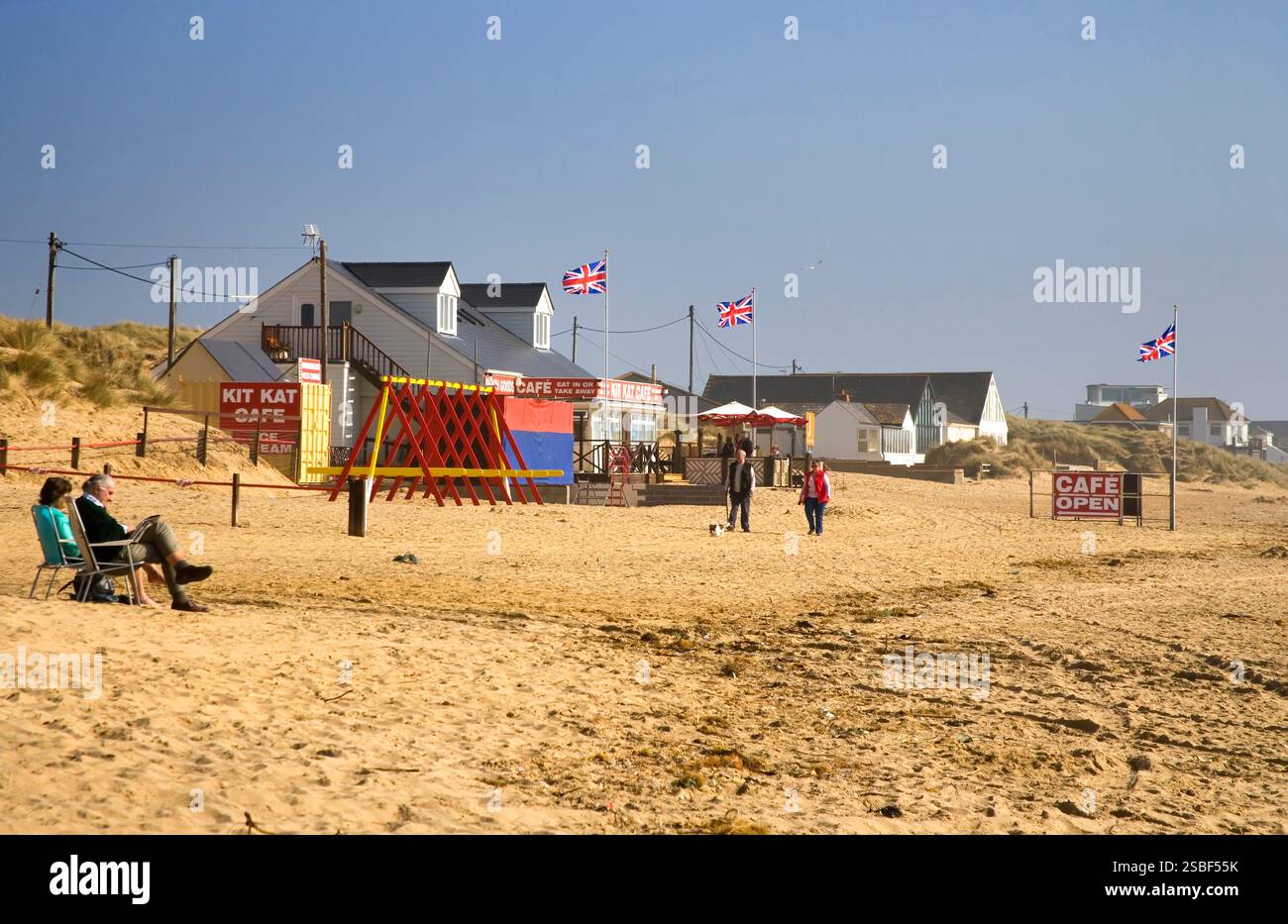 the fine sandy beach and kit kat cafe at camber sands in East sussex ...