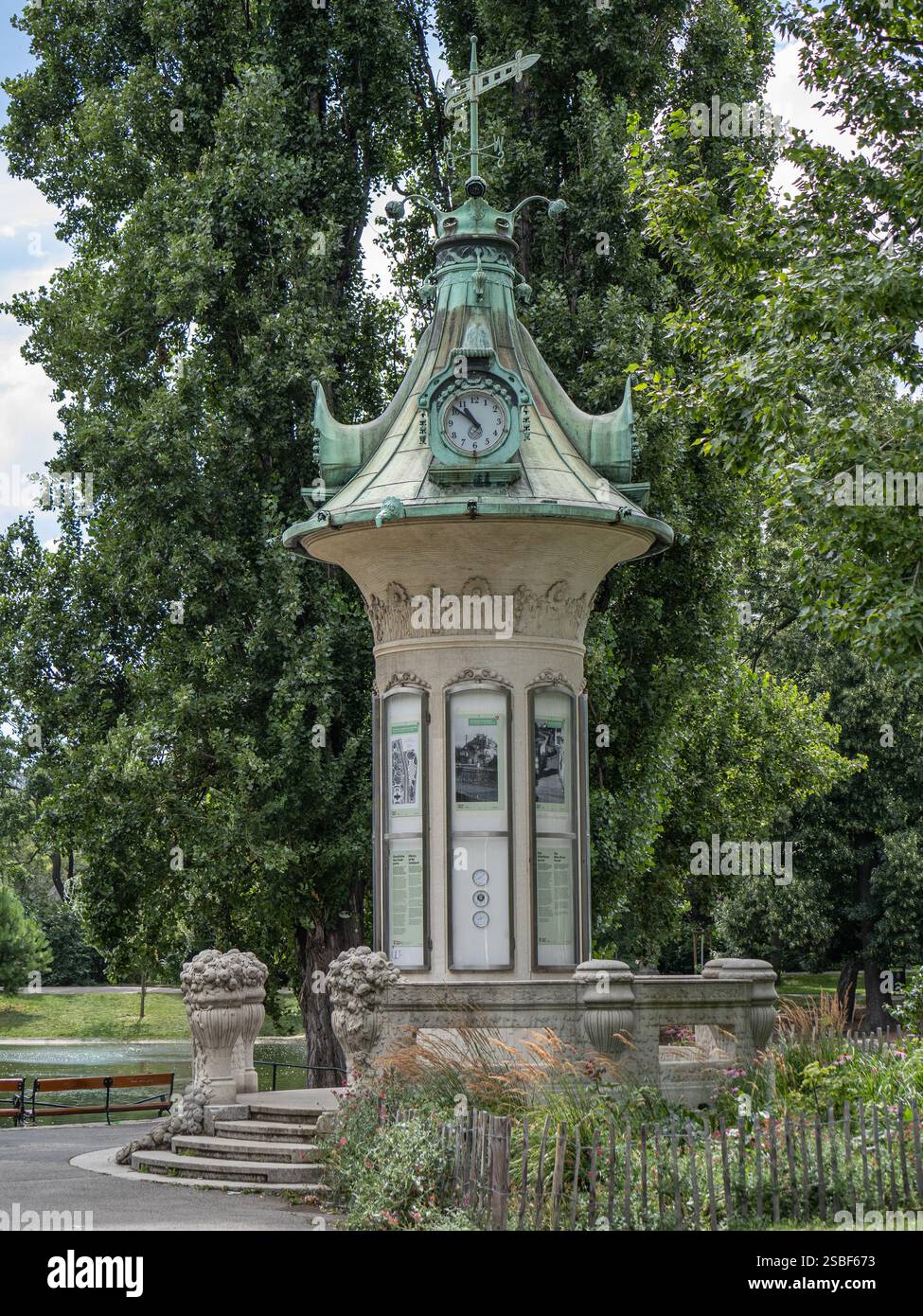 Clock Tower Amidst the Lush Greenery of Vienna's Stadtpark, Austria Stock Photo - Alamy