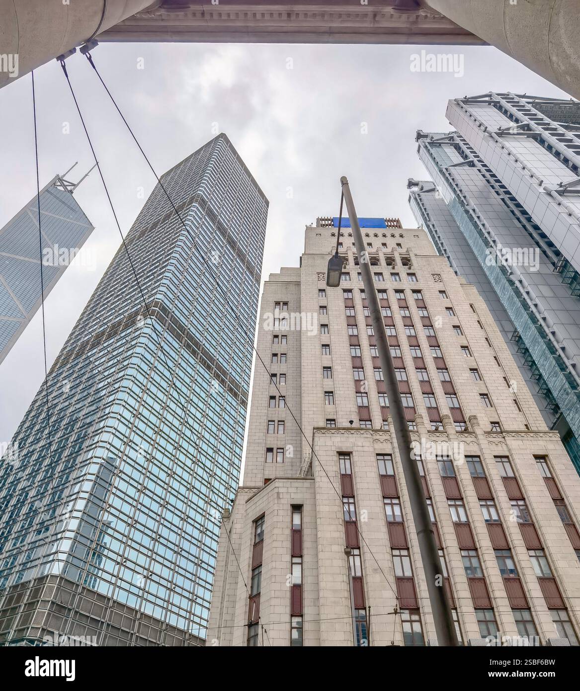 Low-angle close-up view of skyscrapers in Hong Kong, showcasing a mix ...