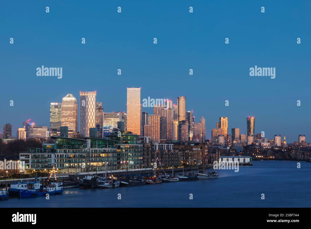 England, London, Docklands, River Thames and Canary Wharf Skyline with ...