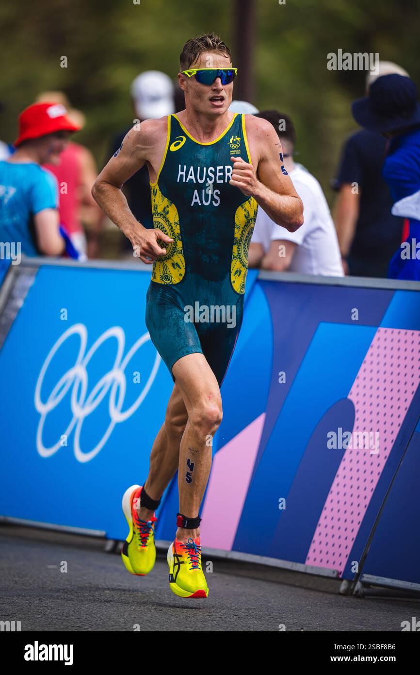 Matthew Hauser participating in the triathlon at the Paris 2024 Olympic ...