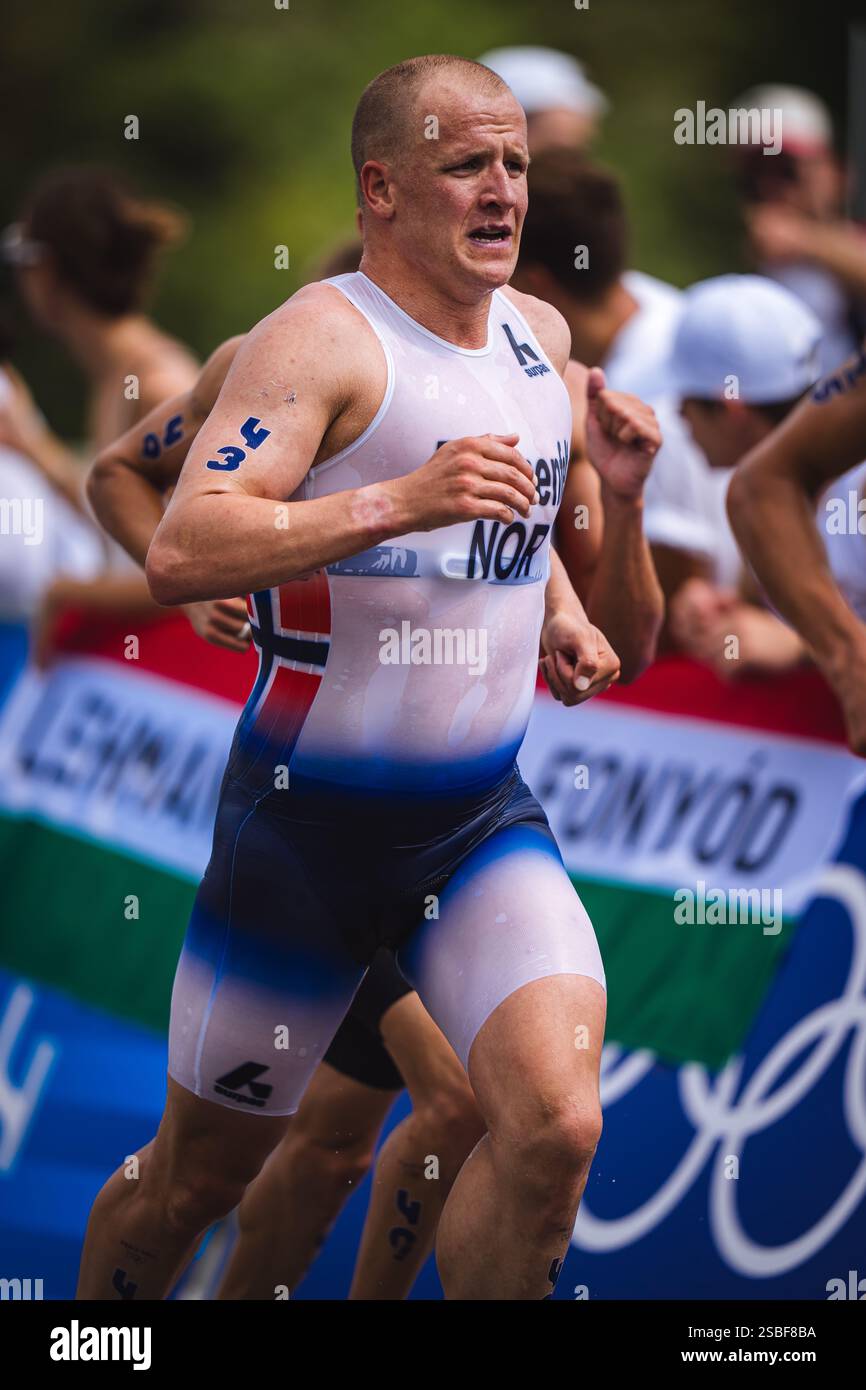 Kristian Blummenfelt participating in the triathlon at the Paris 2024 ...