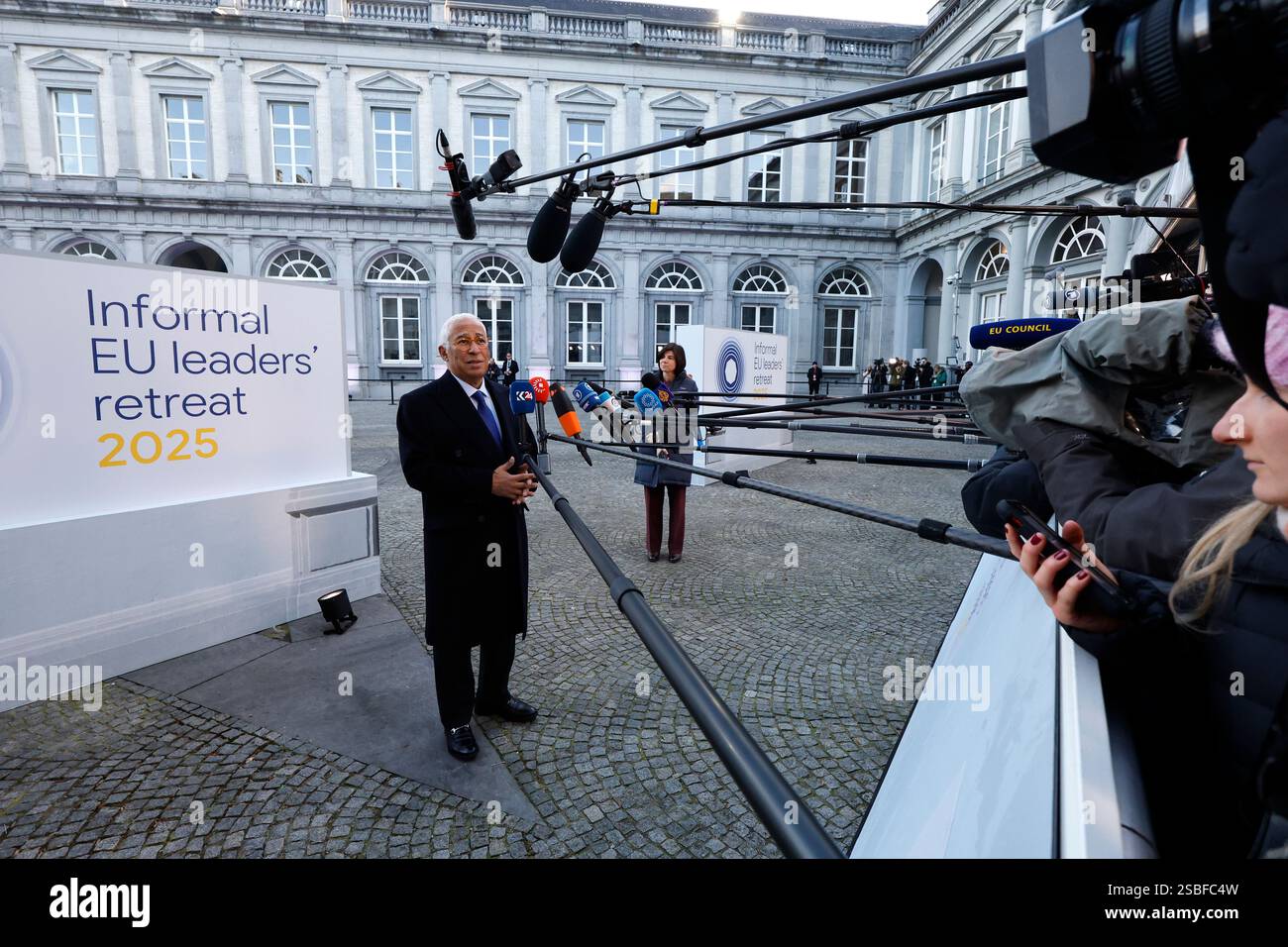 European Council President Antonio Costa, center, speaks with the media as he arrives for an EU ...