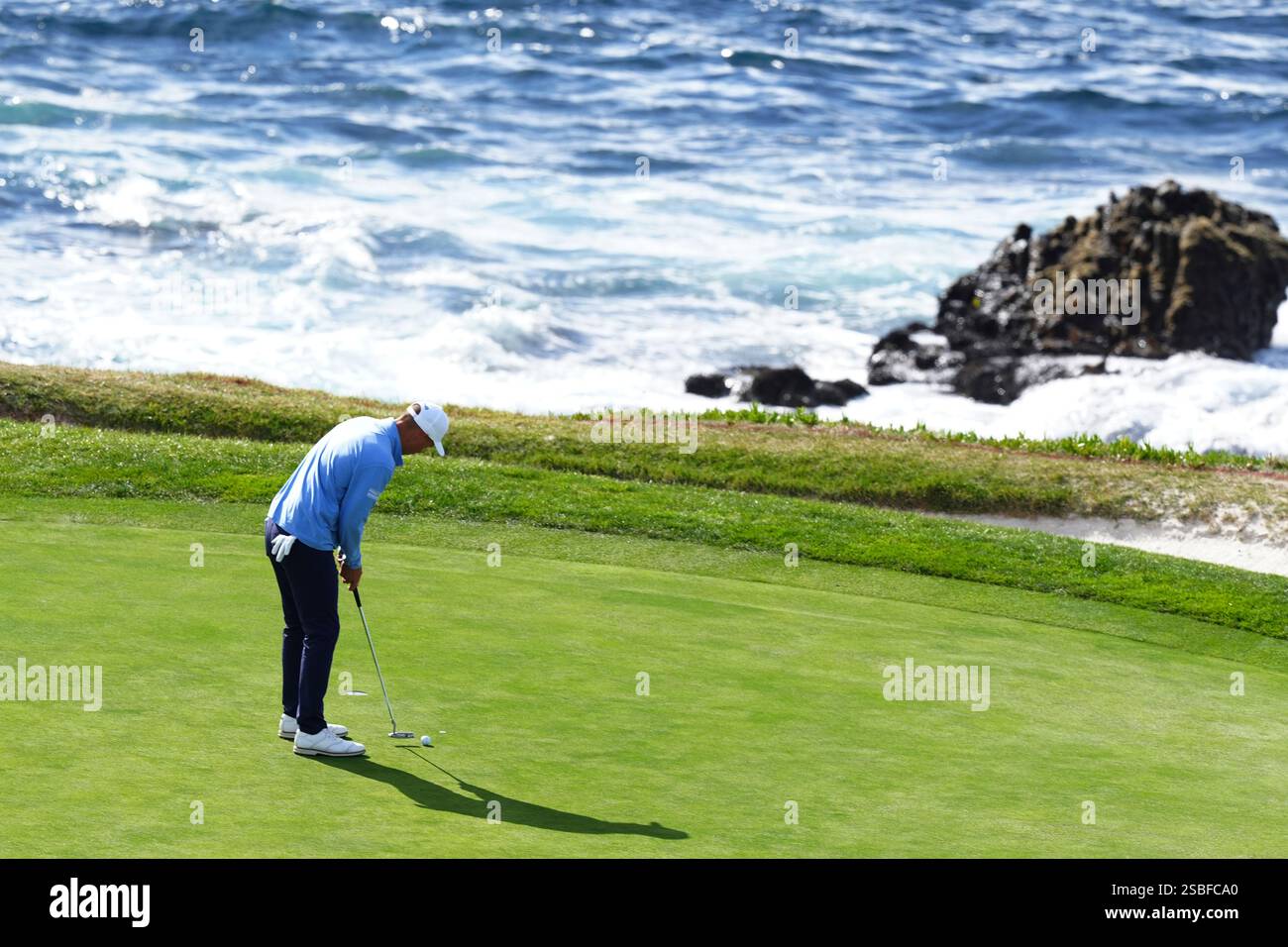 PEBBLE BEACH, CA - FEBRUARY 02: PGA golfer Sam Stevens putts on the 7th ...