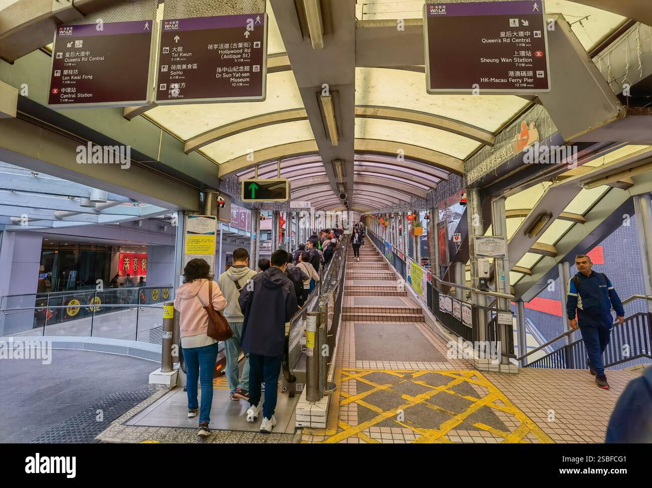 Hong Kong, China - February 01, 2025 : A bustling, covered escalator in ...