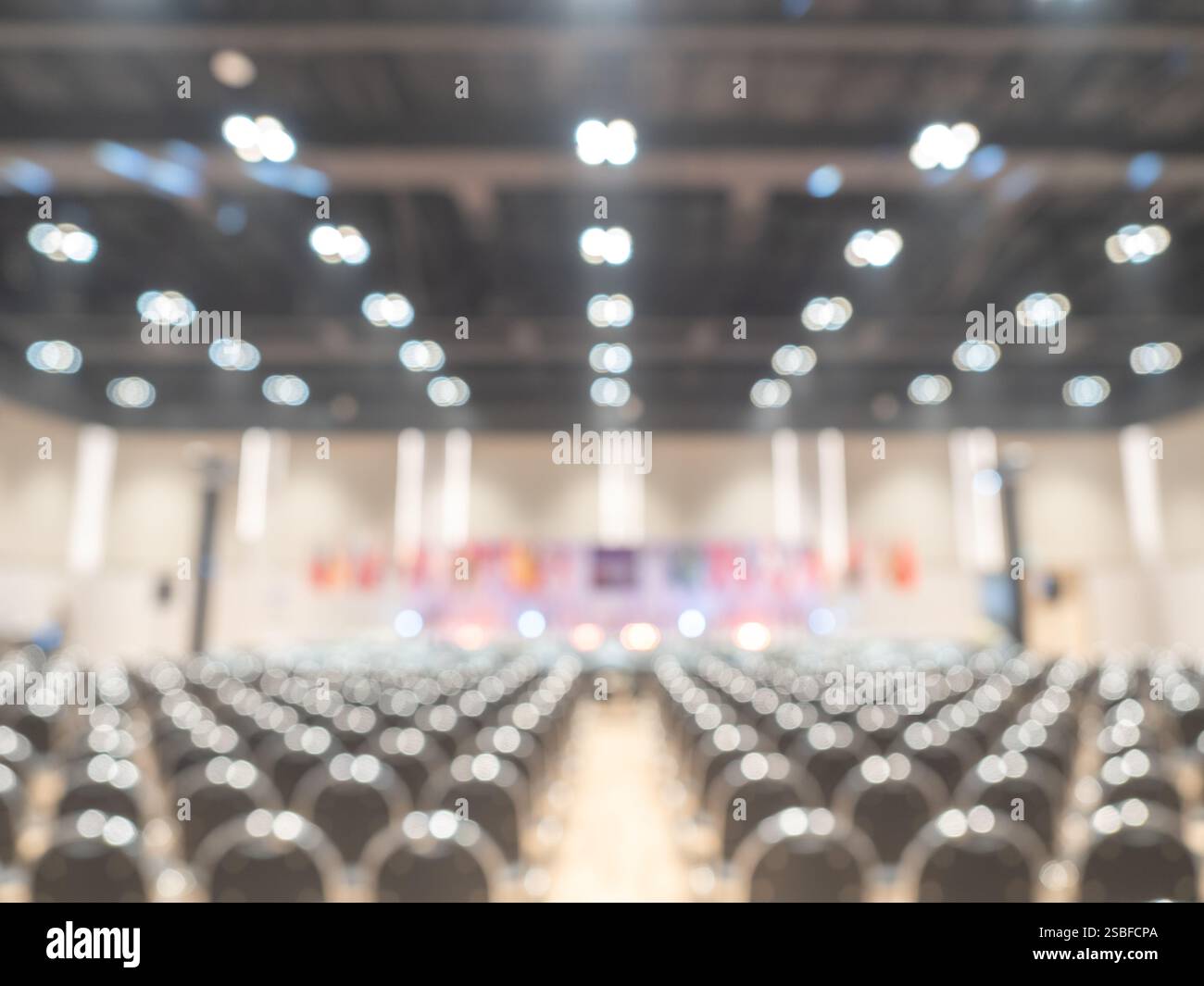Abstract blurred international seminar conference with empty chairs ...